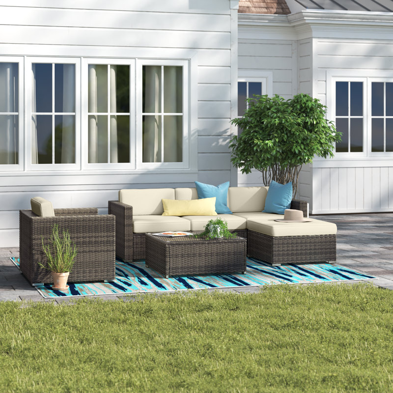 Carmelo 6 Piece Rattan Sectional Seating Group with Cushions